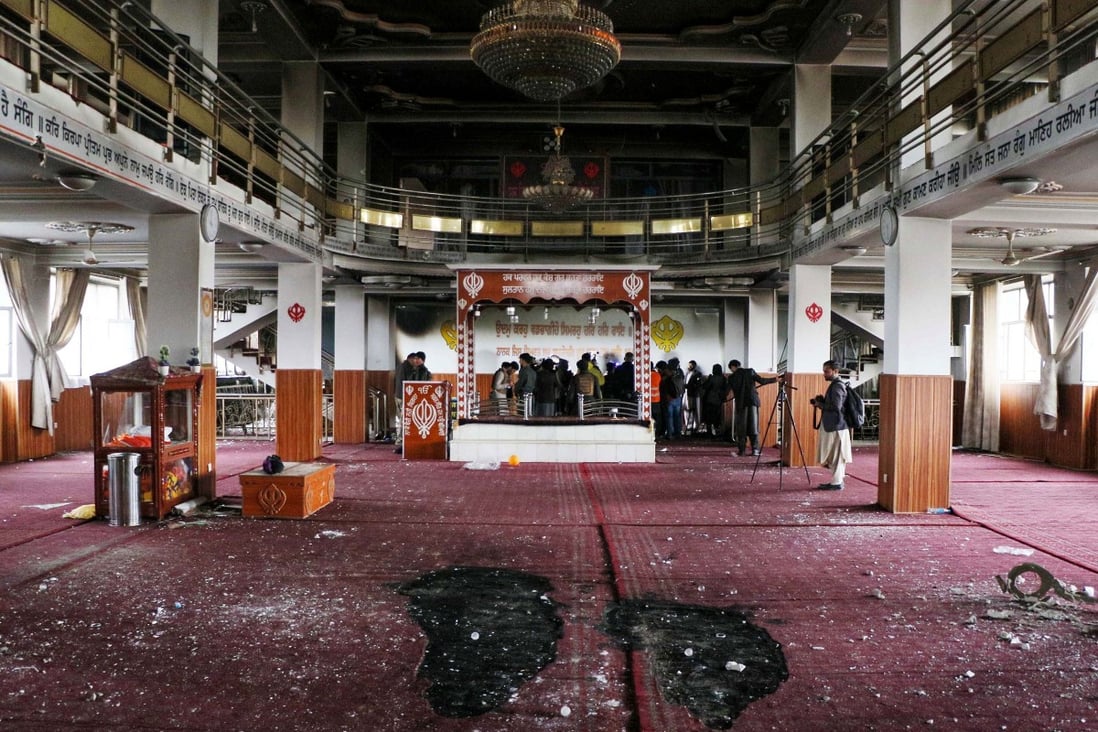 At least 25 worshippers killed in attack on Afghan Sikh-Hindu temple ...