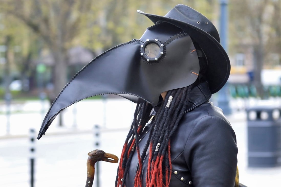 Artists make light of now-mandatory accessory, the face mask, in ...