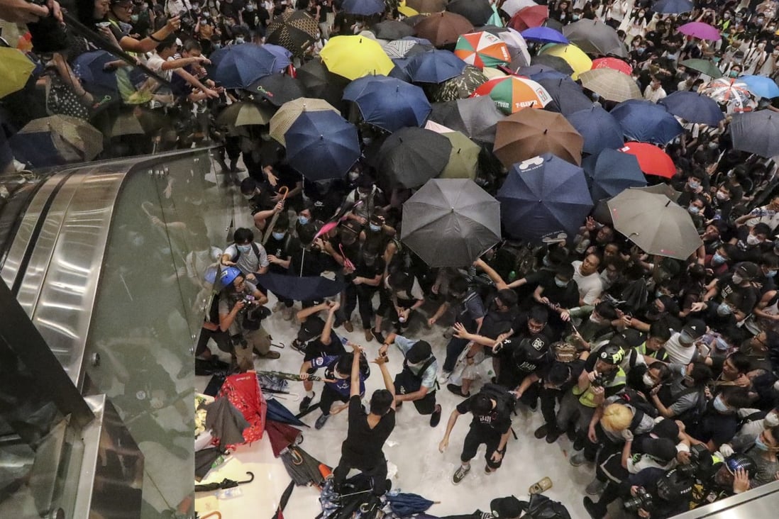 Hong Kong protests: two men, teenager jailed for up to four years over ...