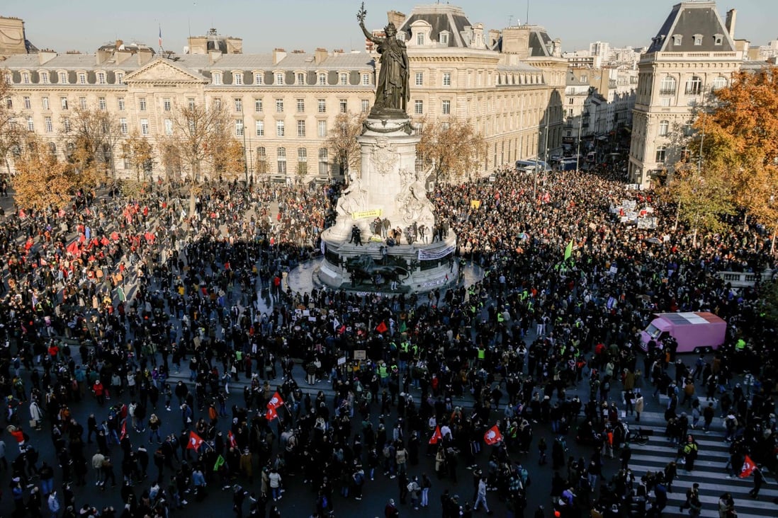 Thousands protest over French security law as pressure piles on Macron ...