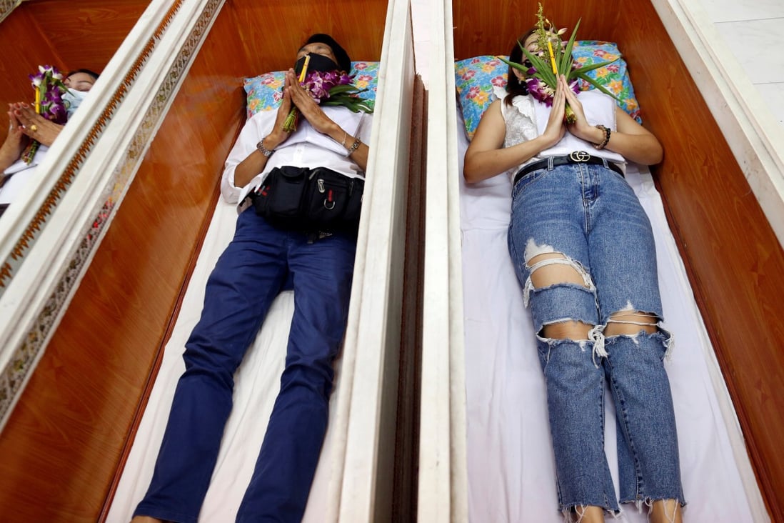 Mock funerals held in Thailand to ‘remember death’, restore fortunes ...
