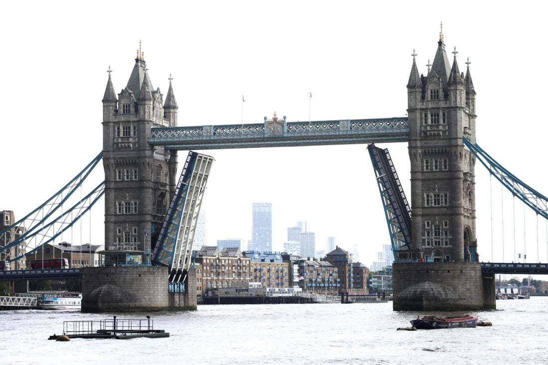 London’s Tower Bridge stuck open after technical failure, causing ...