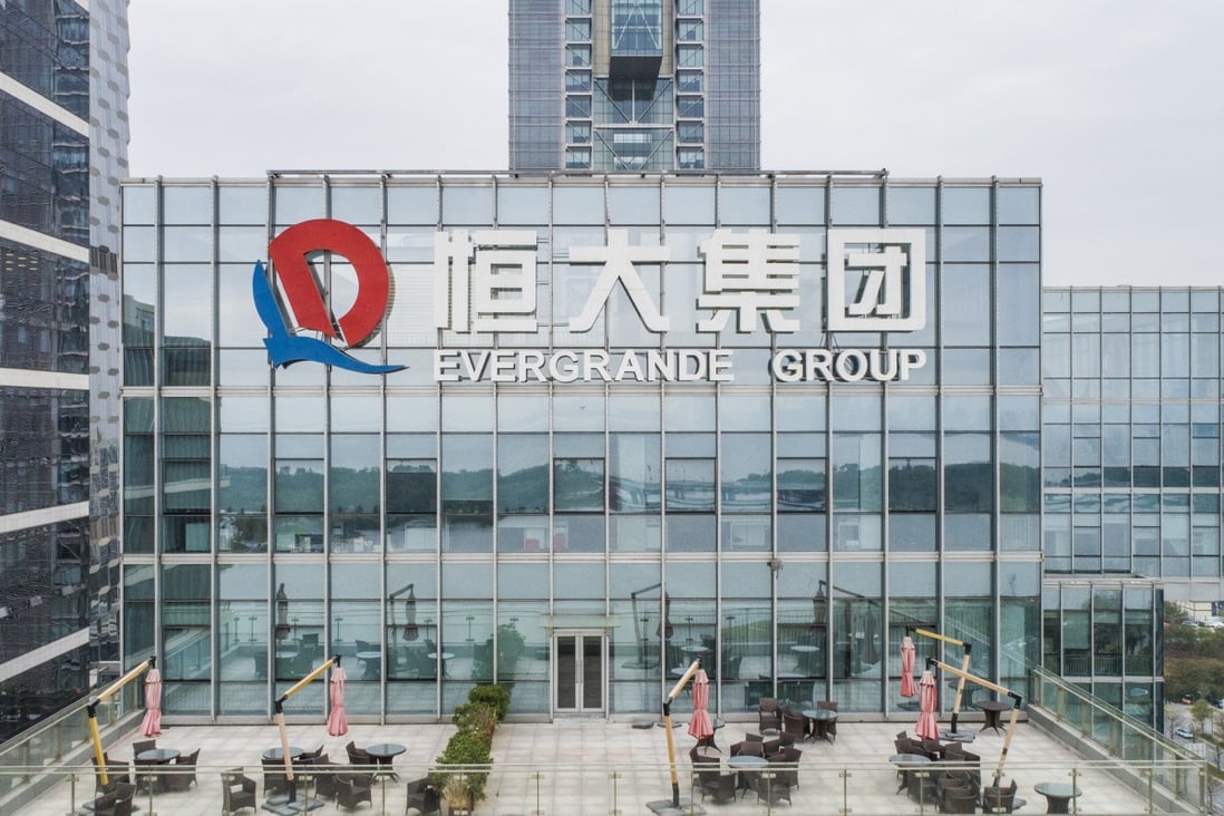 Hong Kong stocks slide for second week as Evergrande sell-off persists ...