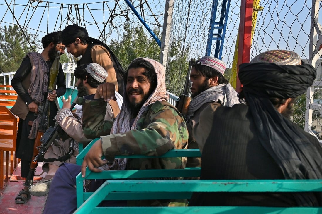 Afghan Taliban fighters enjoy fairground rides, pirate ship a hit ...