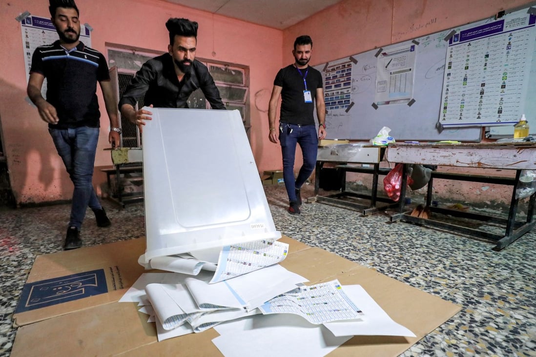 Iraqis head to polls a year early to cast votes, with little hope for ...