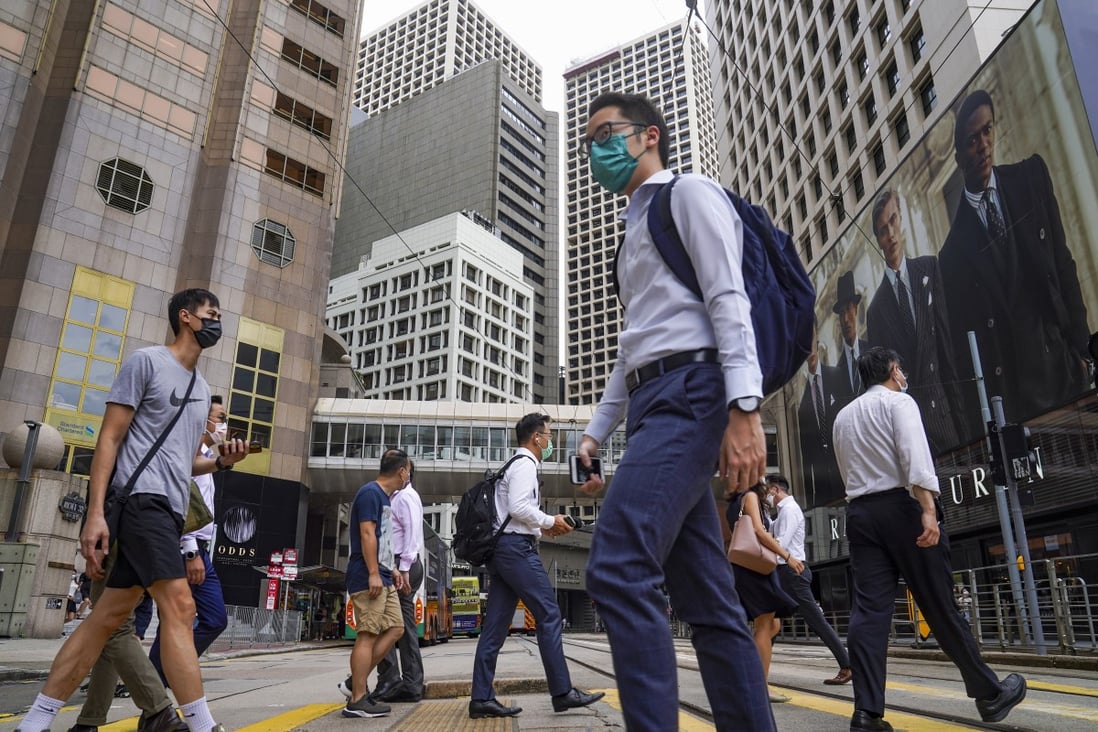 Hong Kong Finance Chief Warns Jobs Market Recovery Is Slowing Backs