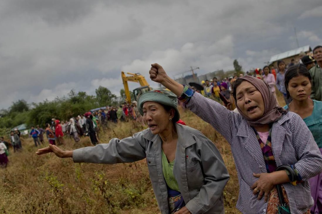 Myanmar police force hundreds from factory area slums as land-grabbing ...