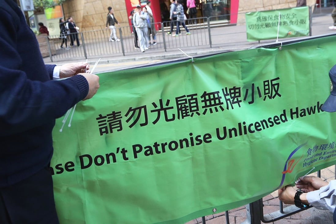 Hong Kong food and health chief defends officials who inspected hawkers ...