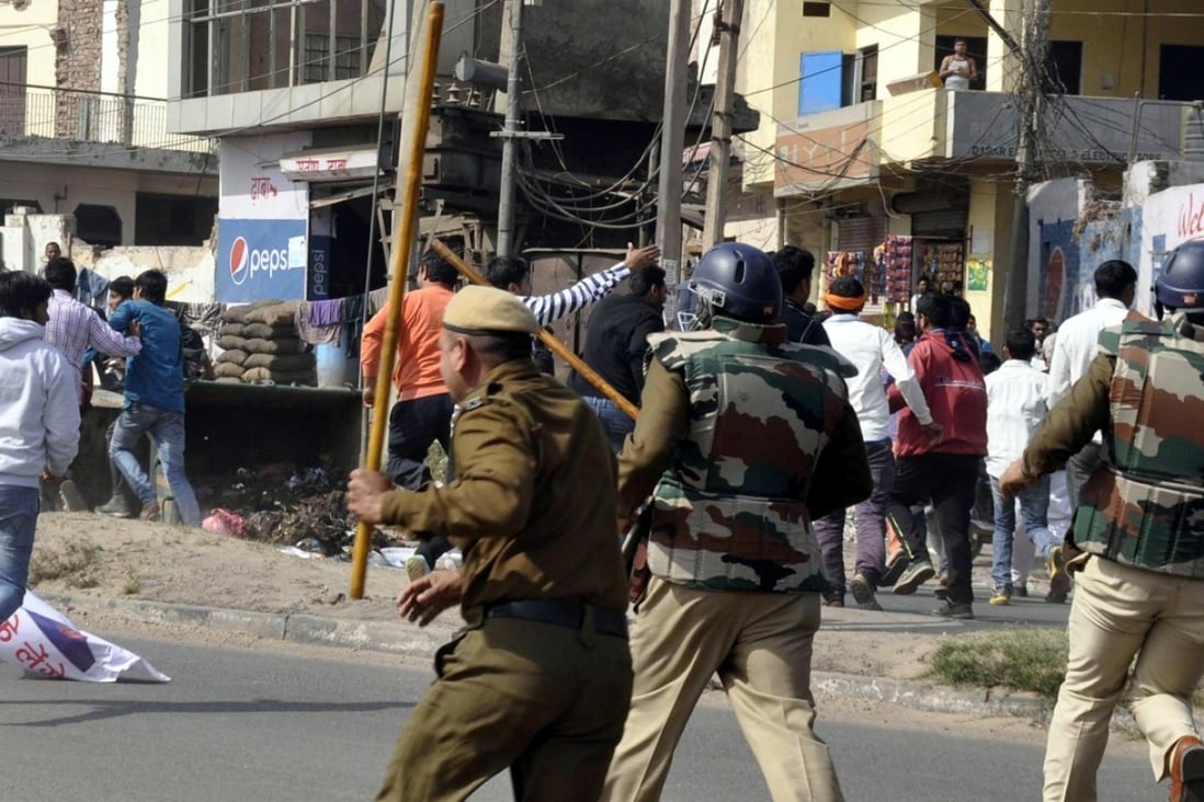 India probes gang rape of women during caste riots | South China ...