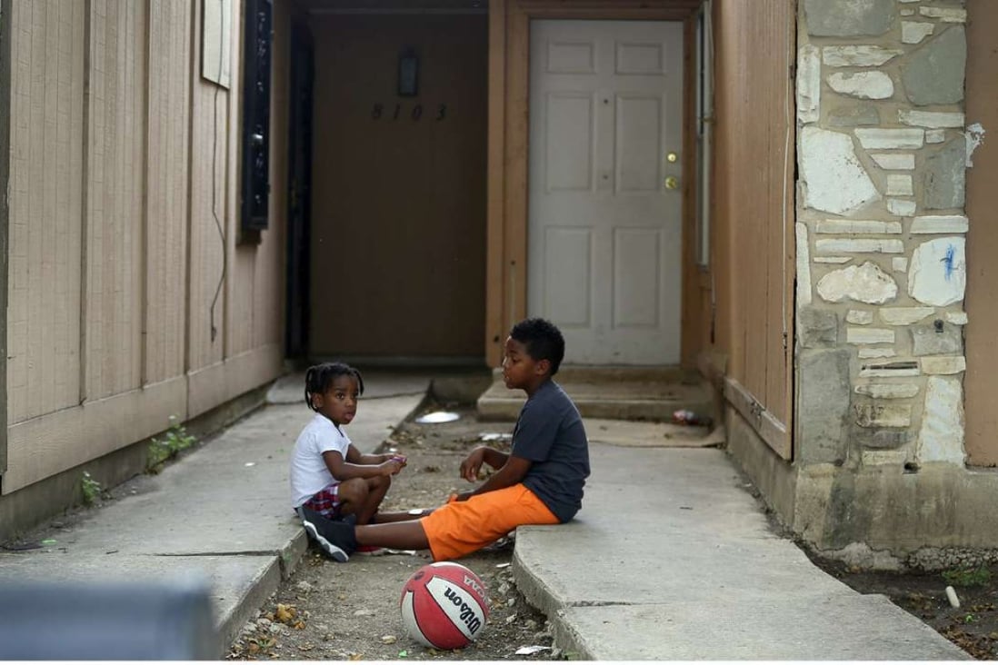 Eight children, including toddlers chained with a dog leash and tied to ...