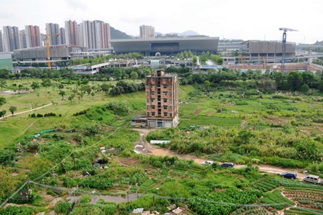 Last one standing: housing block in southern China solitary survivor ...