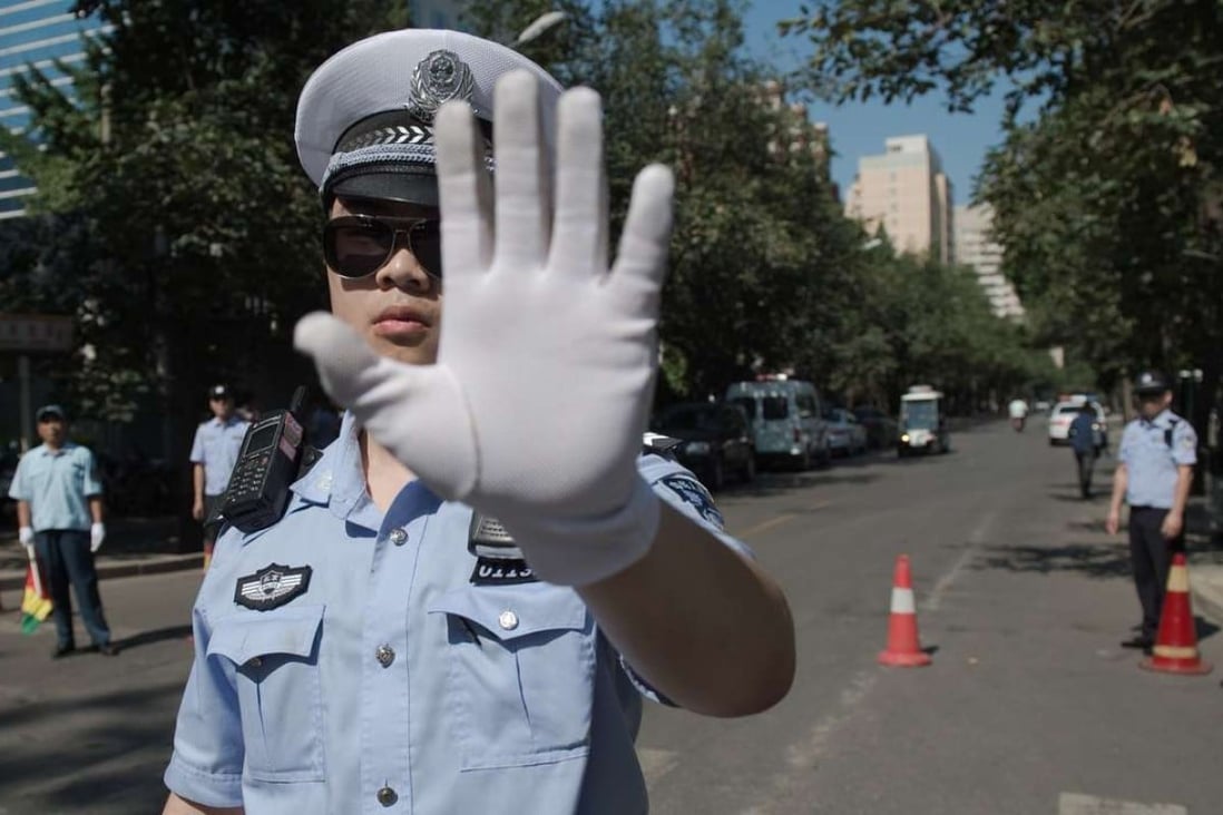 Chinese free to film police - as long as they don’t get in the way ...