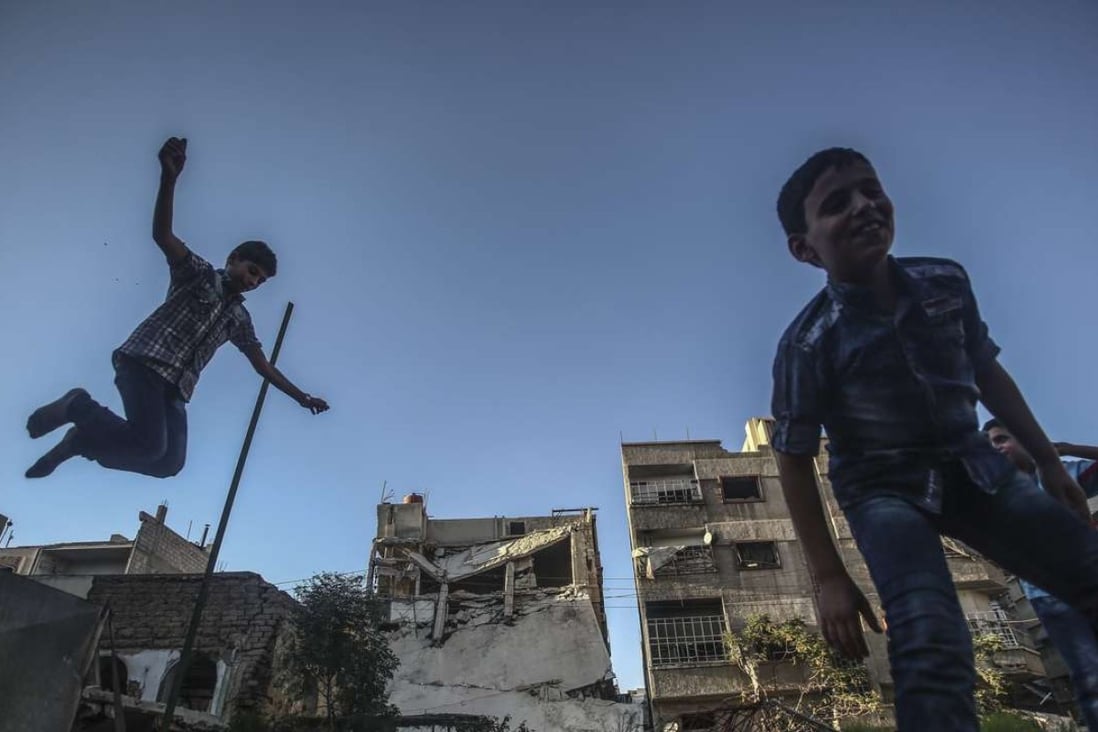 ‘Children are playing in the street’: ceasefire brings rare calm to war ...