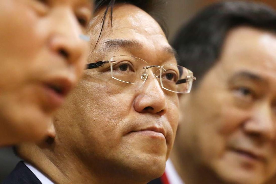 Hong Kong’s rural kingpin has shares in 65 firms, topping lawmakers ...
