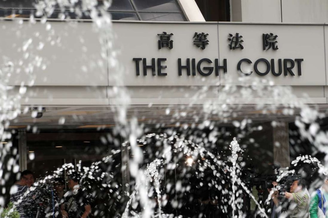 Hong Kong customs officer and wife sue Apple Daily for HK$45 million ...