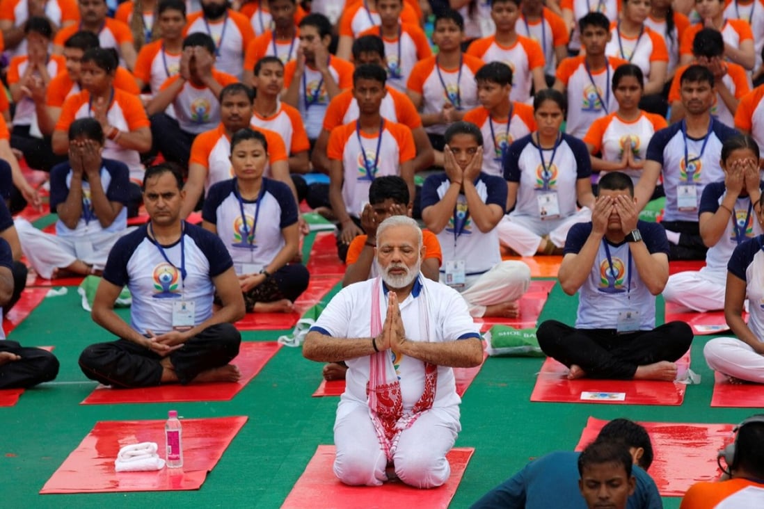 Yoga connecting world, says Indian PM Modi as millions roll out the ...