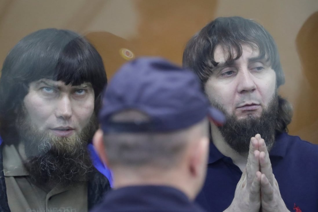 Russia hands lengthy jail terms to five Chechens convicted of ...