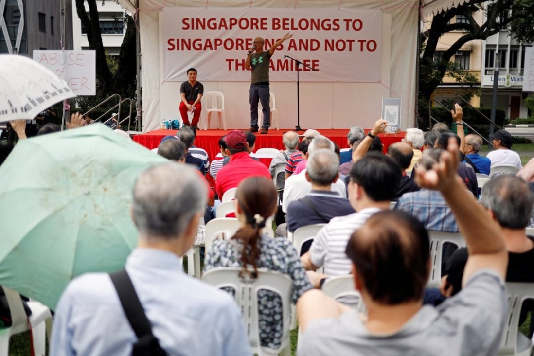 Singaporean protesters call for inquiry over claims PM Lee abused his ...