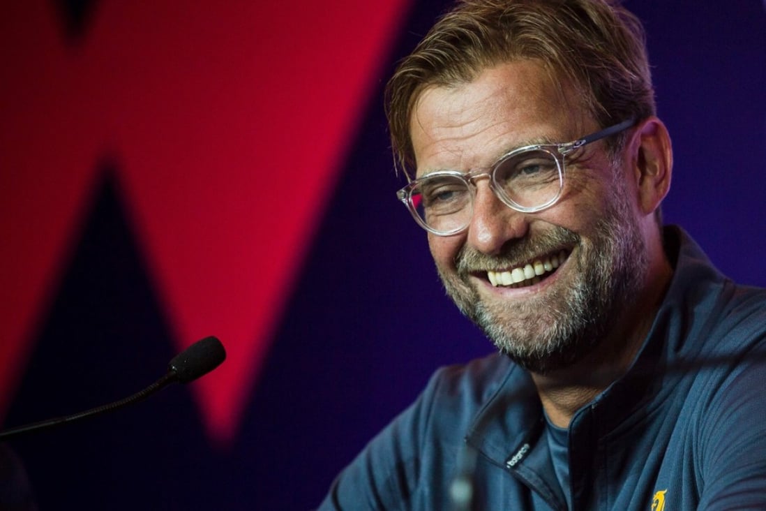 Liverpool boss Jurgen Klopp has a smile on his face again as Hong Kong ...
