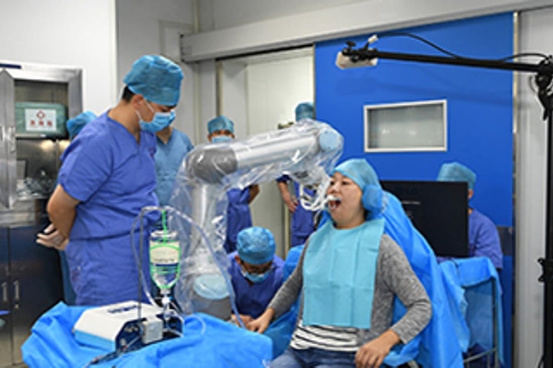 Chinese robot dentist is first to fit implants in patient’s mouth ...