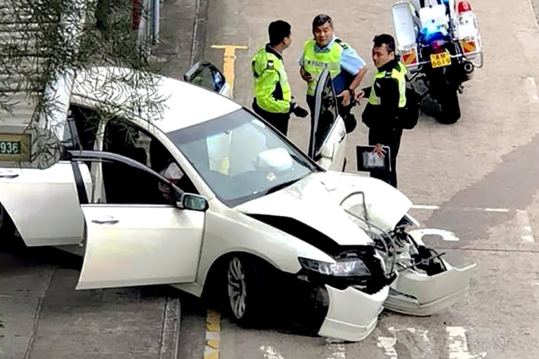Man arrested after car veers into opposite lane, crashing into truck ...