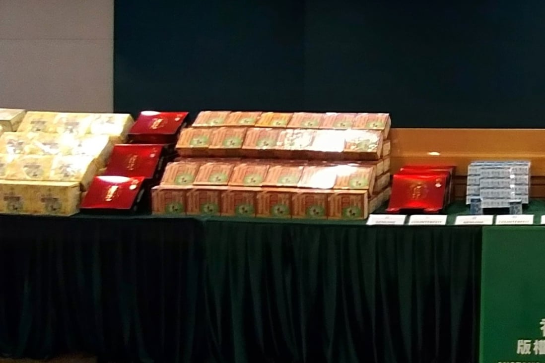Five held as Hong Kong customs break up gang selling fake Chinese ...