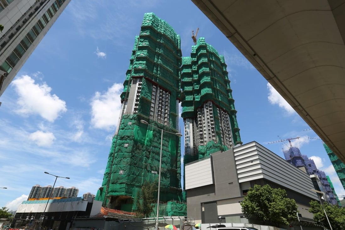 Hong Kong builder New World Development’s interim core profit falls ...