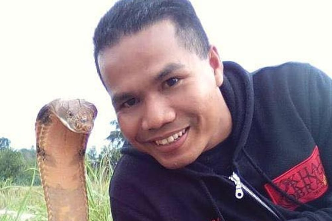 Malaysia’s ‘snake whispering’ firefighter dies after fatal bite ... and ...