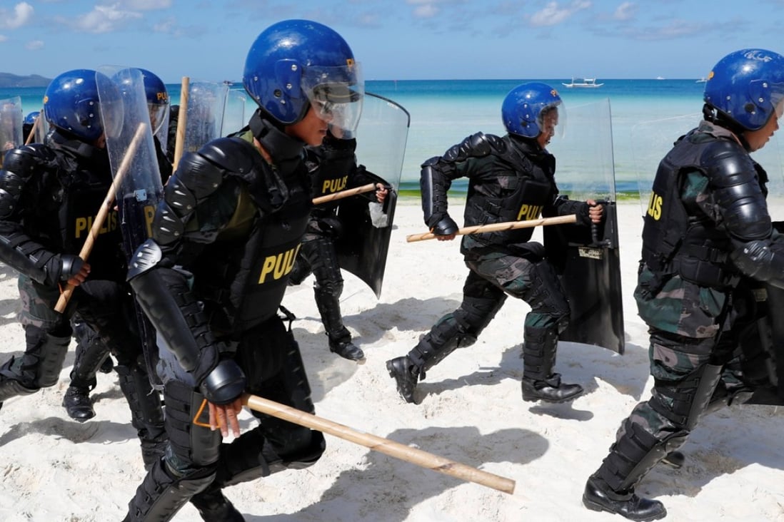 Heavily armed police guard Philippines holiday island Boracay ahead of ...
