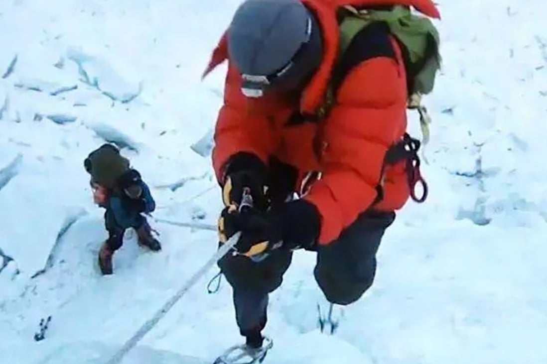 Chinese climber, 69, crippled on Everest, finally scales peak | South ...