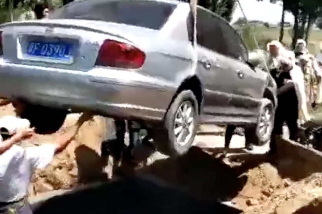 Chinese man buried in his car as dying wish is granted | South China ...