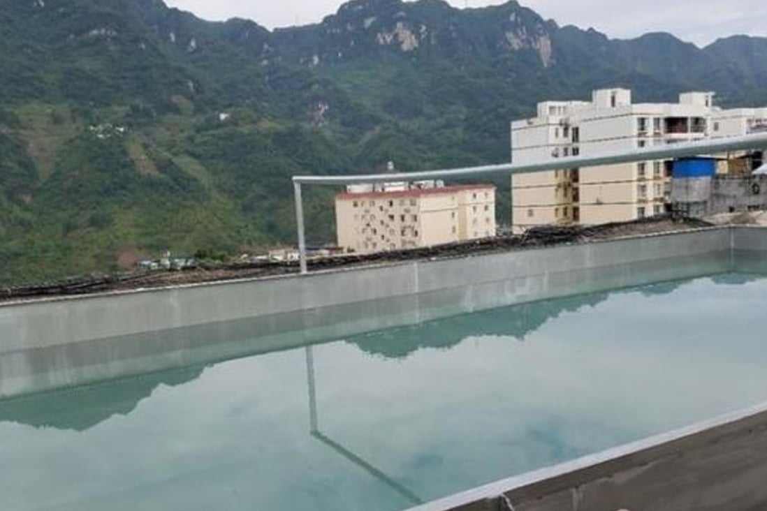 Chinese man builds illegal swimming pool on tower block roof | South ...