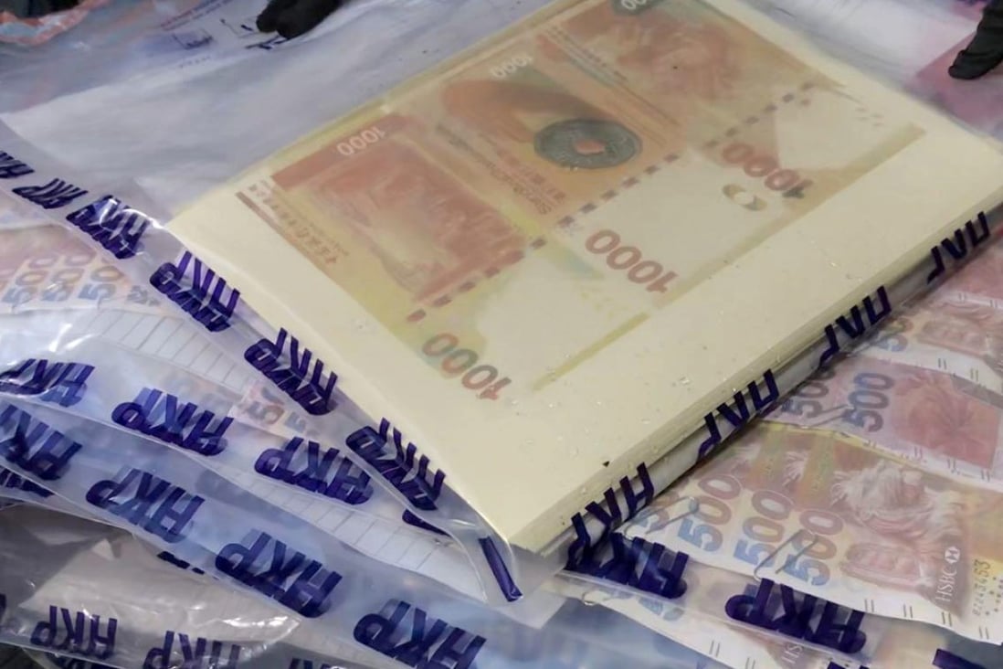 Police arrest three men and seize HK$1.37 million in fake cash during ...