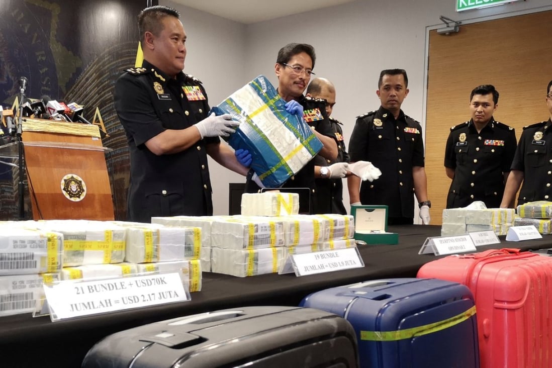 Eight Malaysian former spies under probe for corruption | South China ...