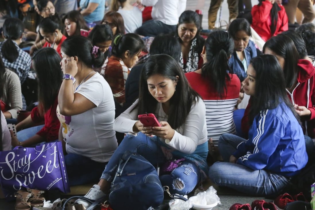 Filipino domestic workers in Hong Kong vow to fight plan for mandatory ...