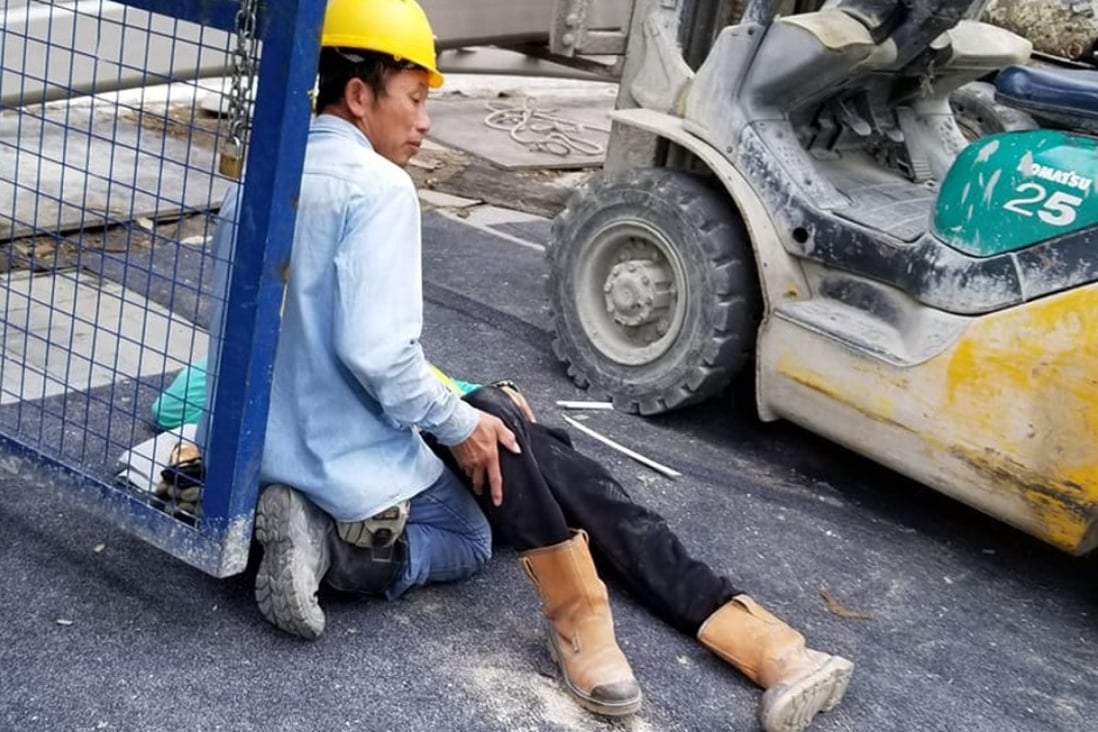 Two workers injured by falling metal gate at Hong Kong construction ...