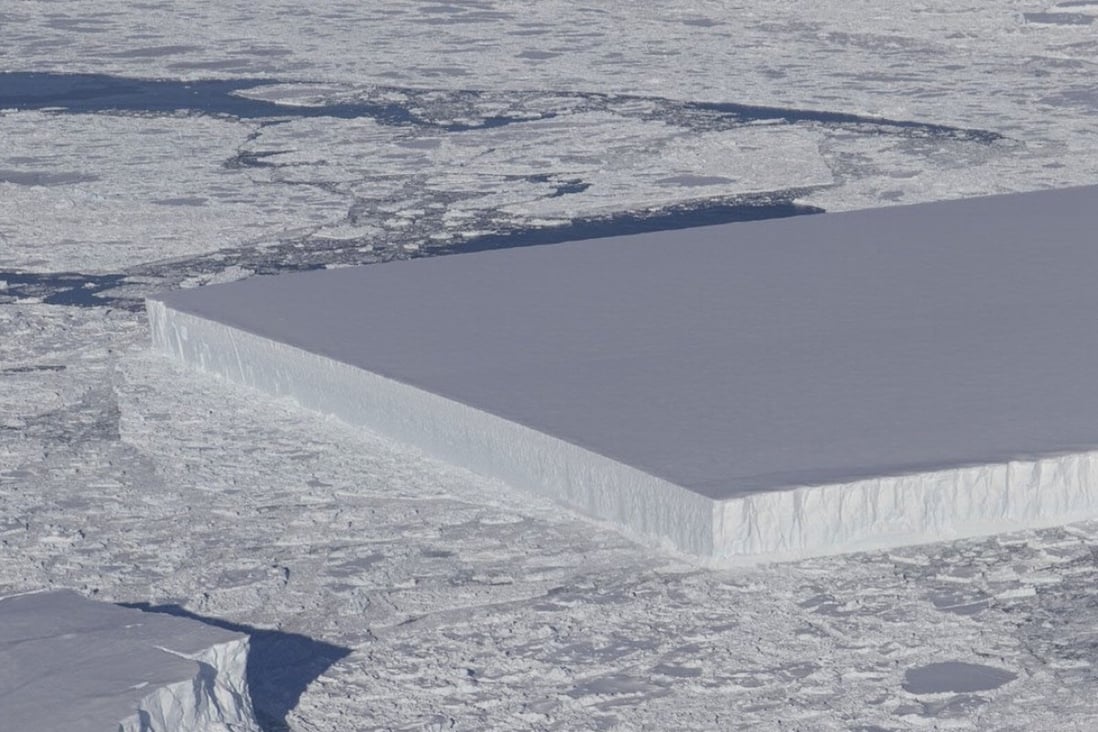 Perfectly rectangular iceberg floating off Antarctica looks ...