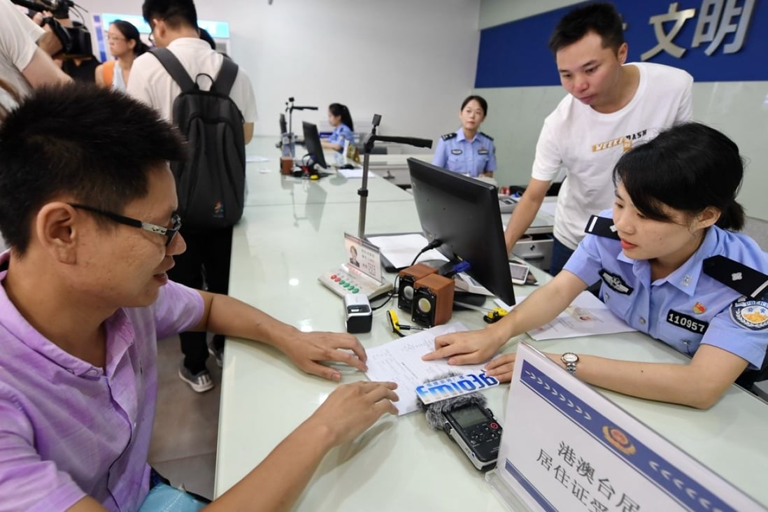 70,000 Hongkongers seek new mainland China resident permit despite tax ...