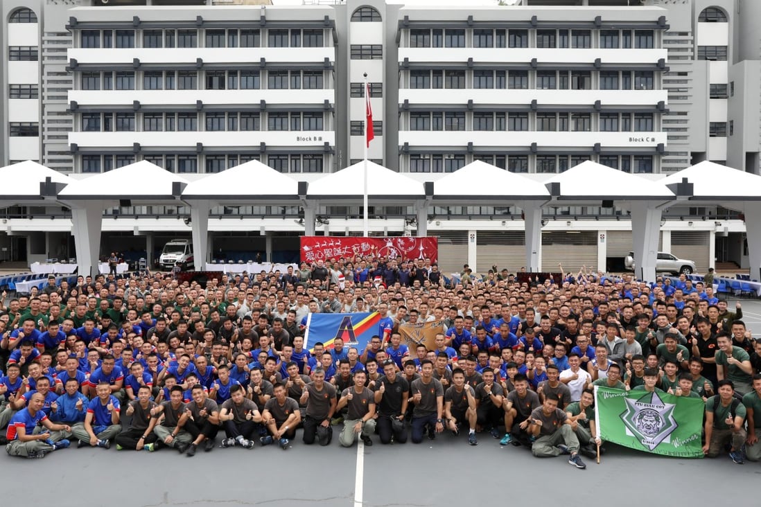 Hong Kong’s Police Tactical Unit tests speed and strength in aid of ...