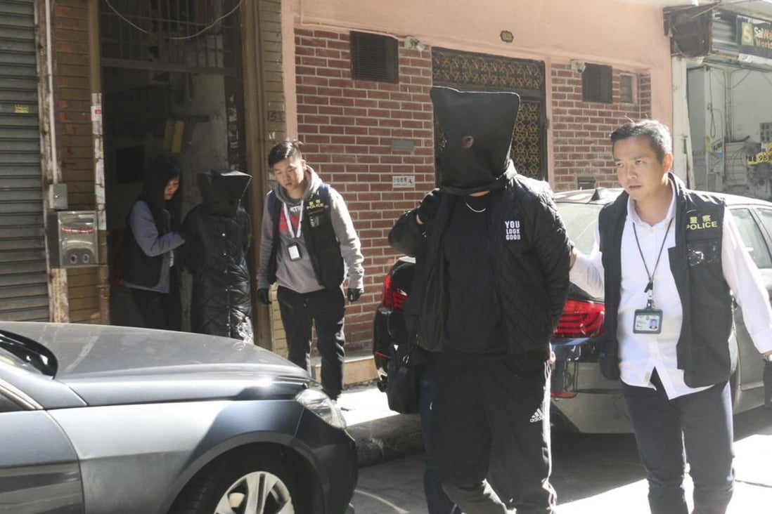 Suspected Hong Kong Triad Member And Girlfriend Held After Police Seize