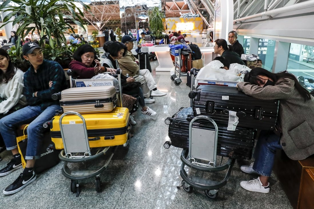 China Airlines promises compensation to stranded passengers as pilot ...