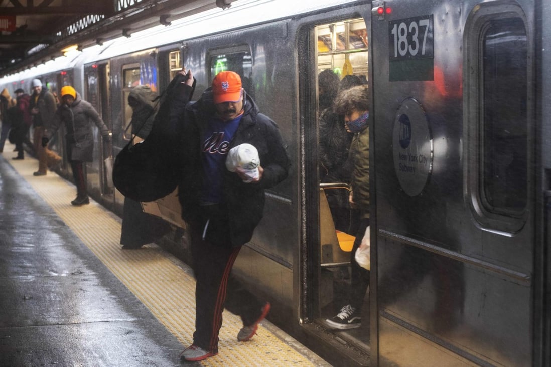 Subway horror in New York as passing train snags man standing too close ...