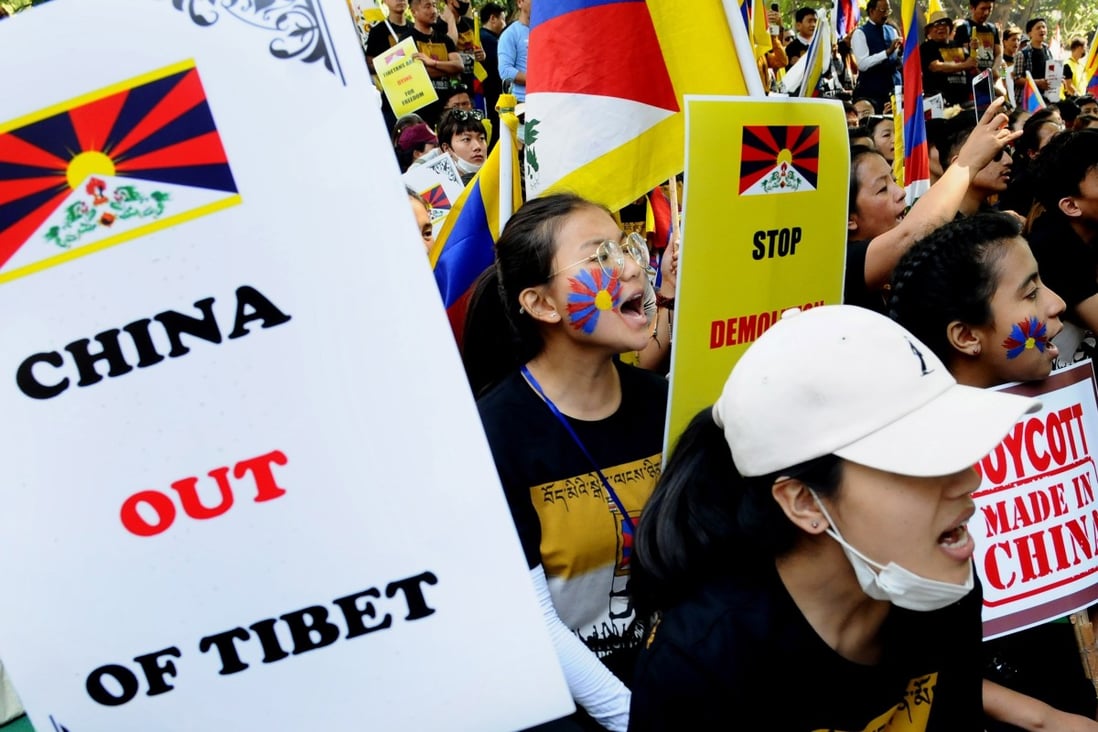 Thousands of Tibetans protest on 60th anniversary of uprising against ...
