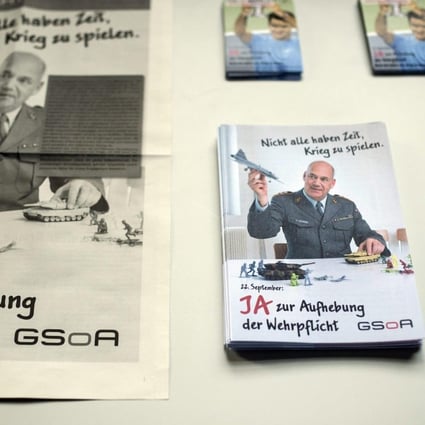 Swiss voters reject move to end conscription army | South China Morning ...