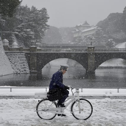 Eleven dead and 1,200 injured as heavy snow hits Japan | South China ...