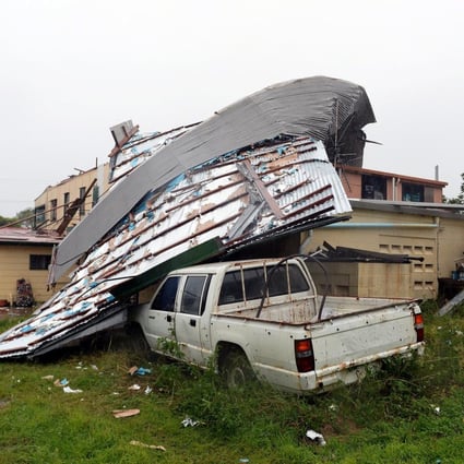No casualties as cyclone slams into Queensland coast, but alerts remain ...