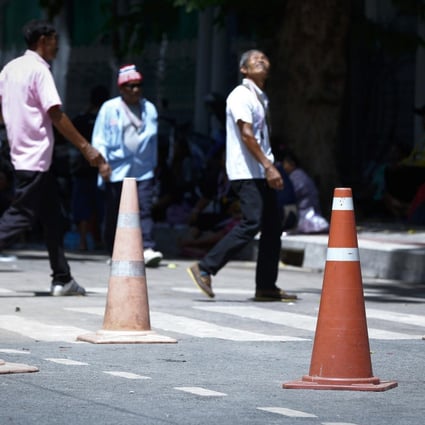 ‘Holy traffic cones’ symbolise the turmoil that engulfs Thai politics ...