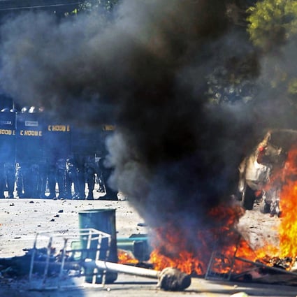 Protestors and police clash in Rio and Sao Paulo ahead of World Cup ...