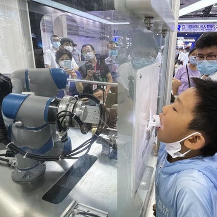 Chinese-built robot that can do quick Covid-19 oral swab tests, other ...