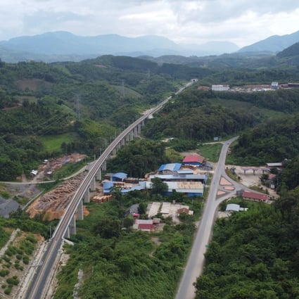 Laos’ fast train to China brings connection at a cost, with big ...